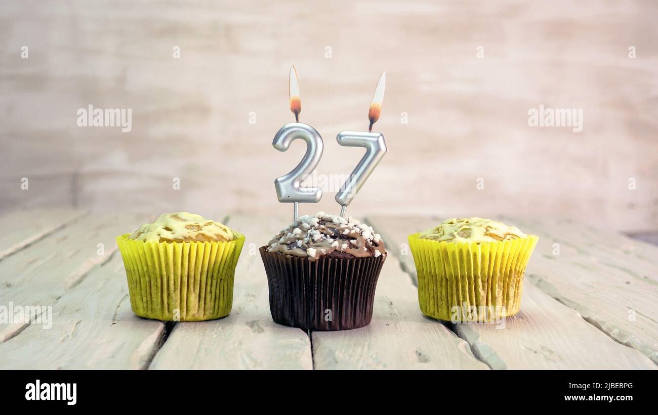 Happy birthday muffins with candles with the number. Card copy space ...