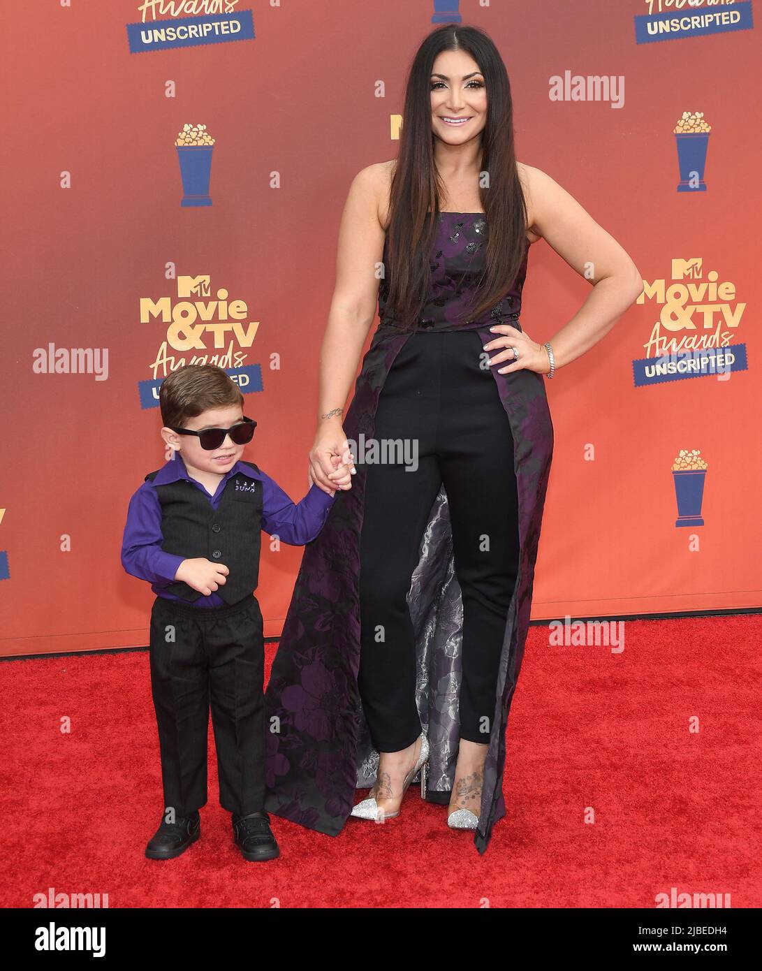 Deena Cortese and Son Cameron Theo Buckner arrives at the 2022 MTV ...