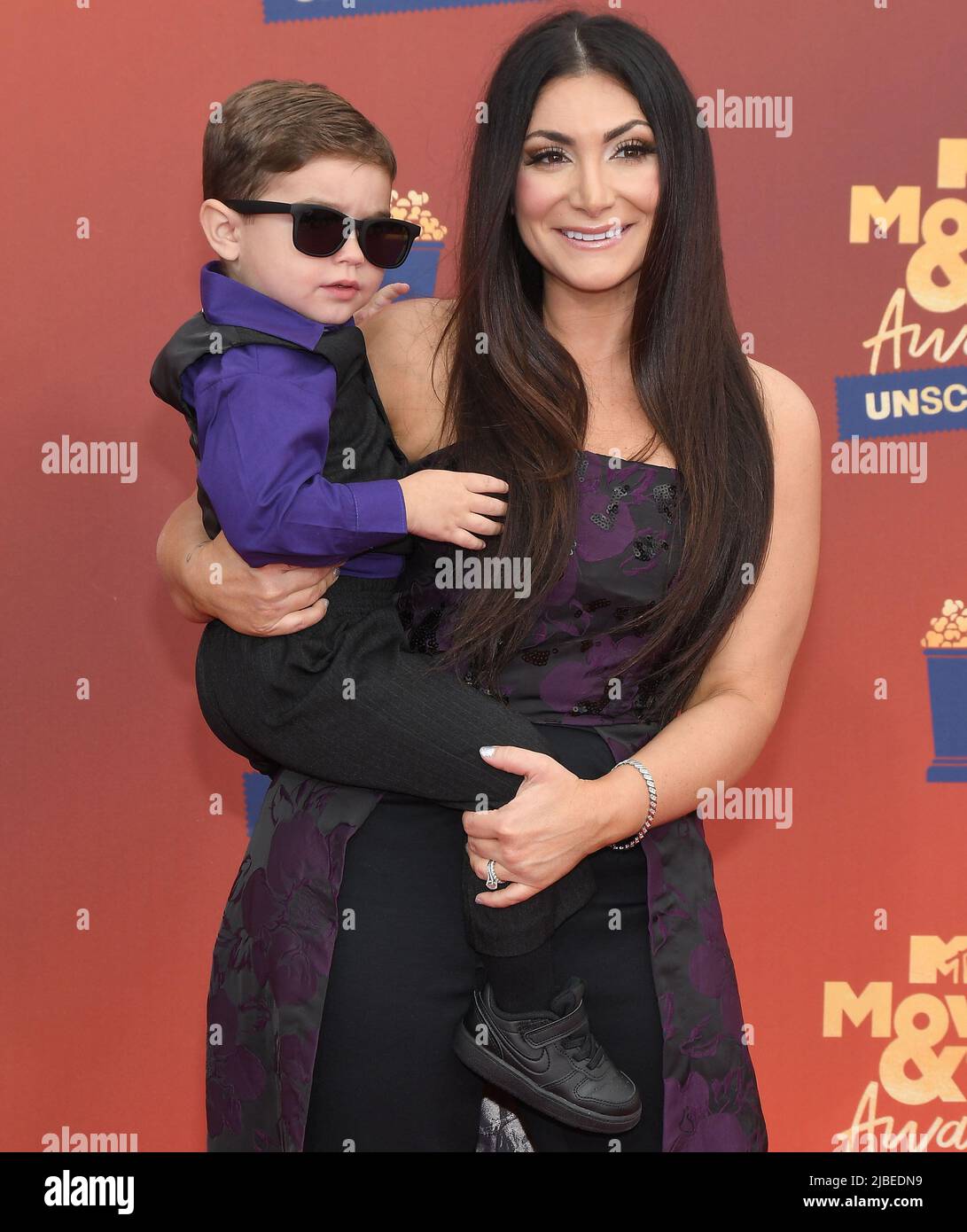 Deena Cortese and Son Cameron Theo Buckner arrives at the 2022 MTV ...