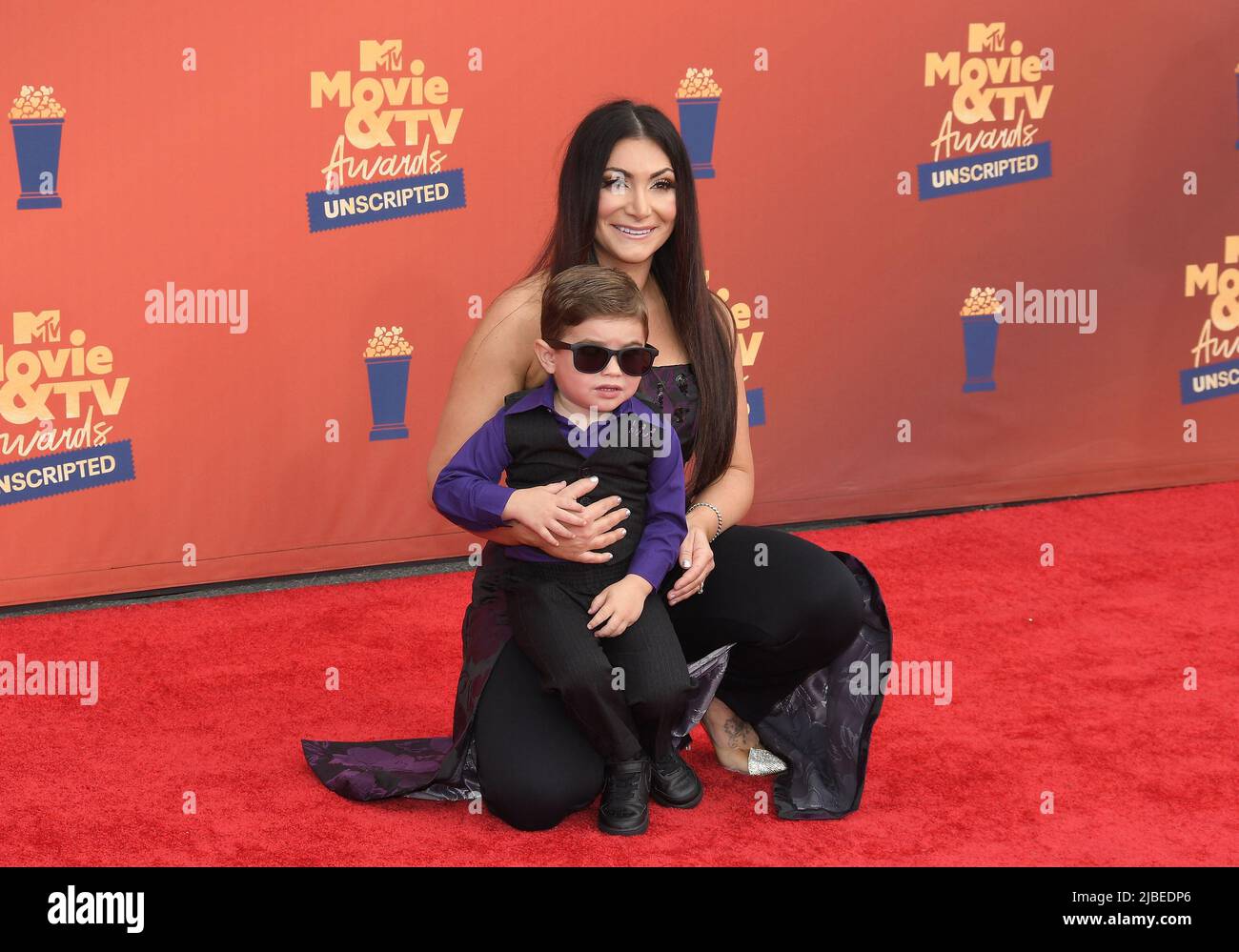 Deena Cortese and Son Cameron Theo Buckner arrives at the 2022 MTV ...