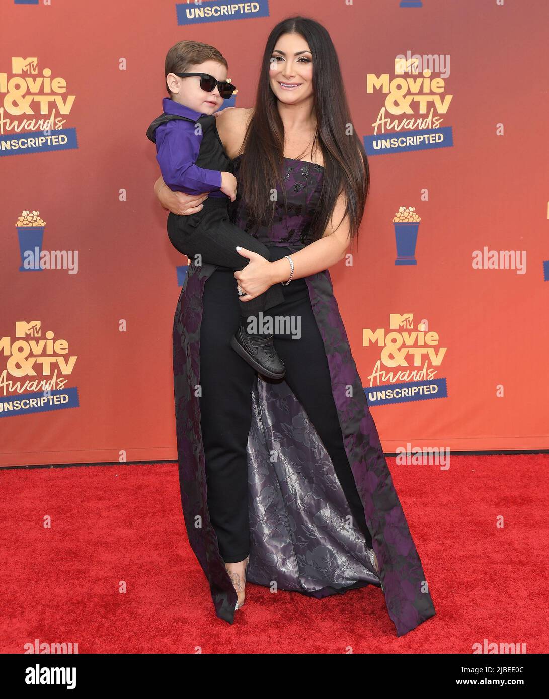 Deena Cortese and Son Cameron Theo Buckner arrives at the 2022 MTV ...