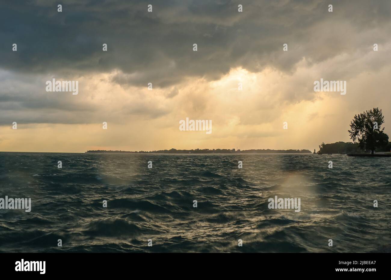 A summer rainstorm forming over the Lake Erie Shores and Islands at ...