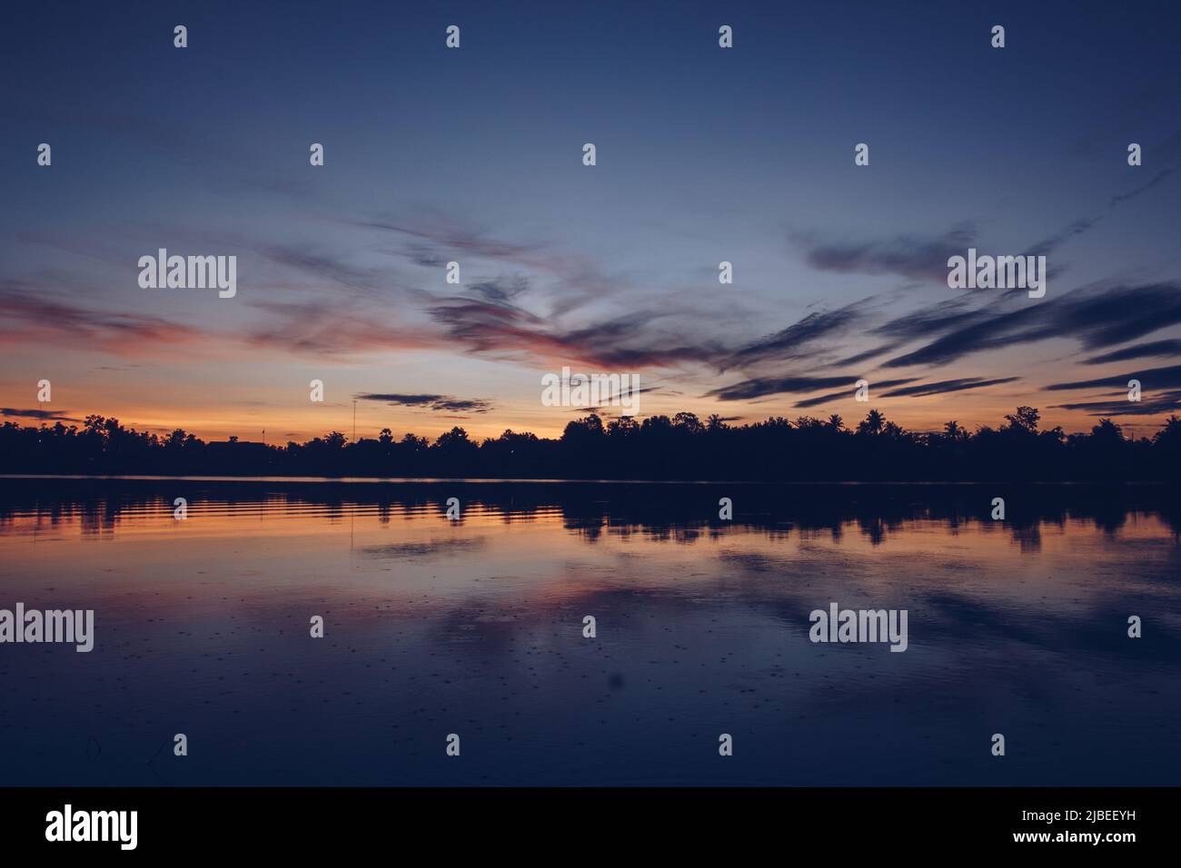 Beautiful sun light in the evening at the river Stock Photo - Alamy