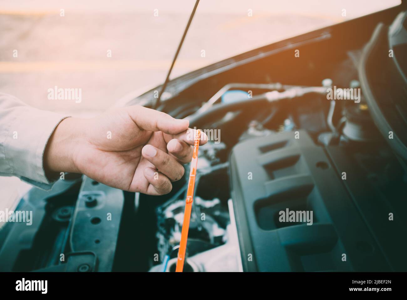 Car Engine oil maintenance repair automotive worker.Focusing soft ...