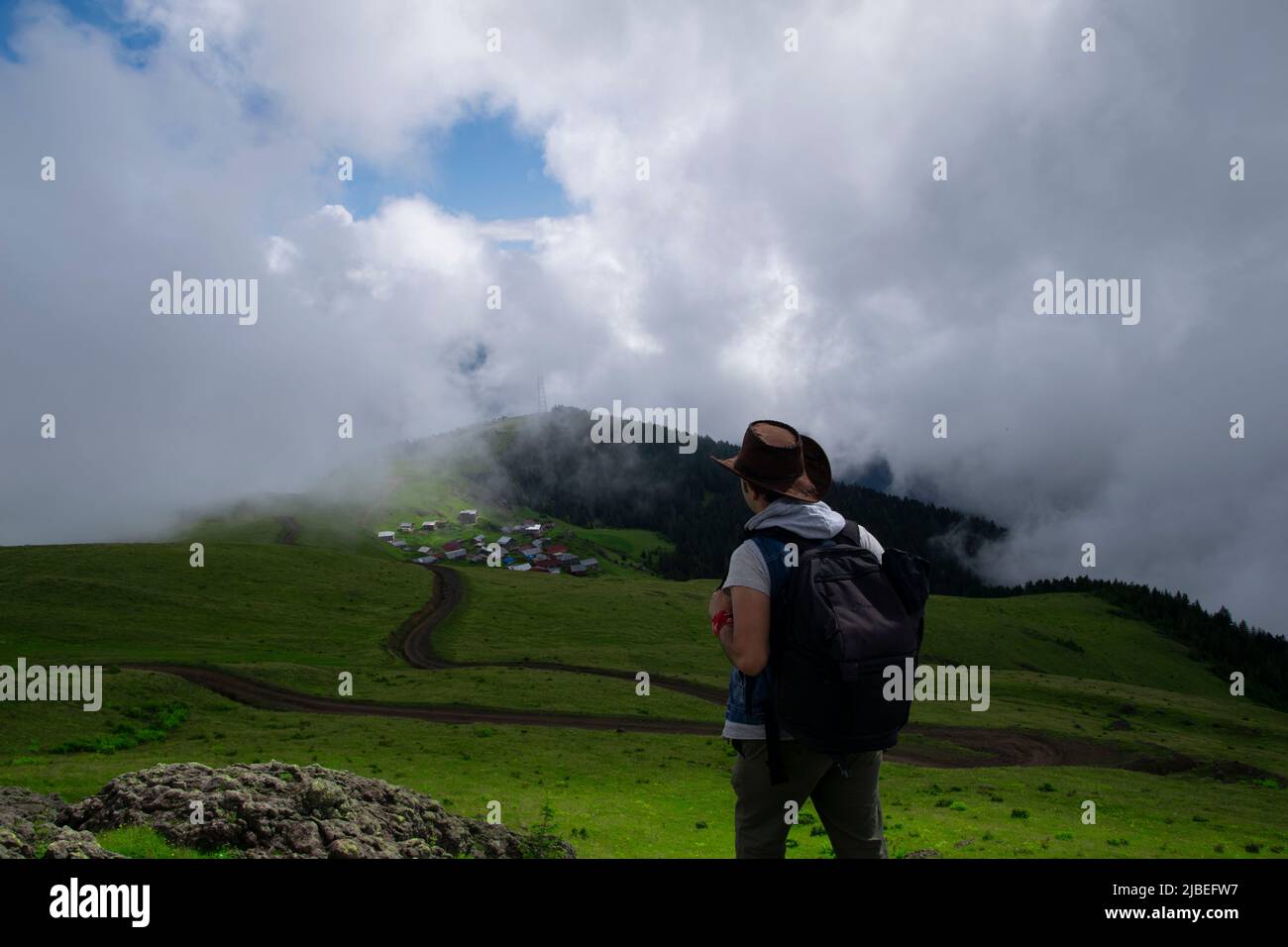 Rize, Turkey - July 2016: A tourist watching the sea of clouds on the ...