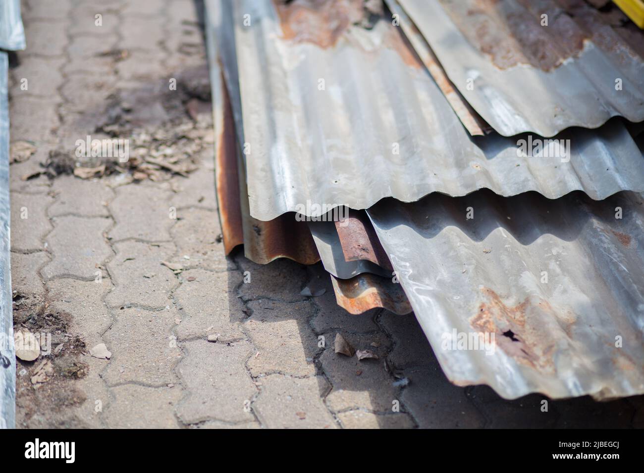 Old zinc, stacked to the ground Stock Photo - Alamy