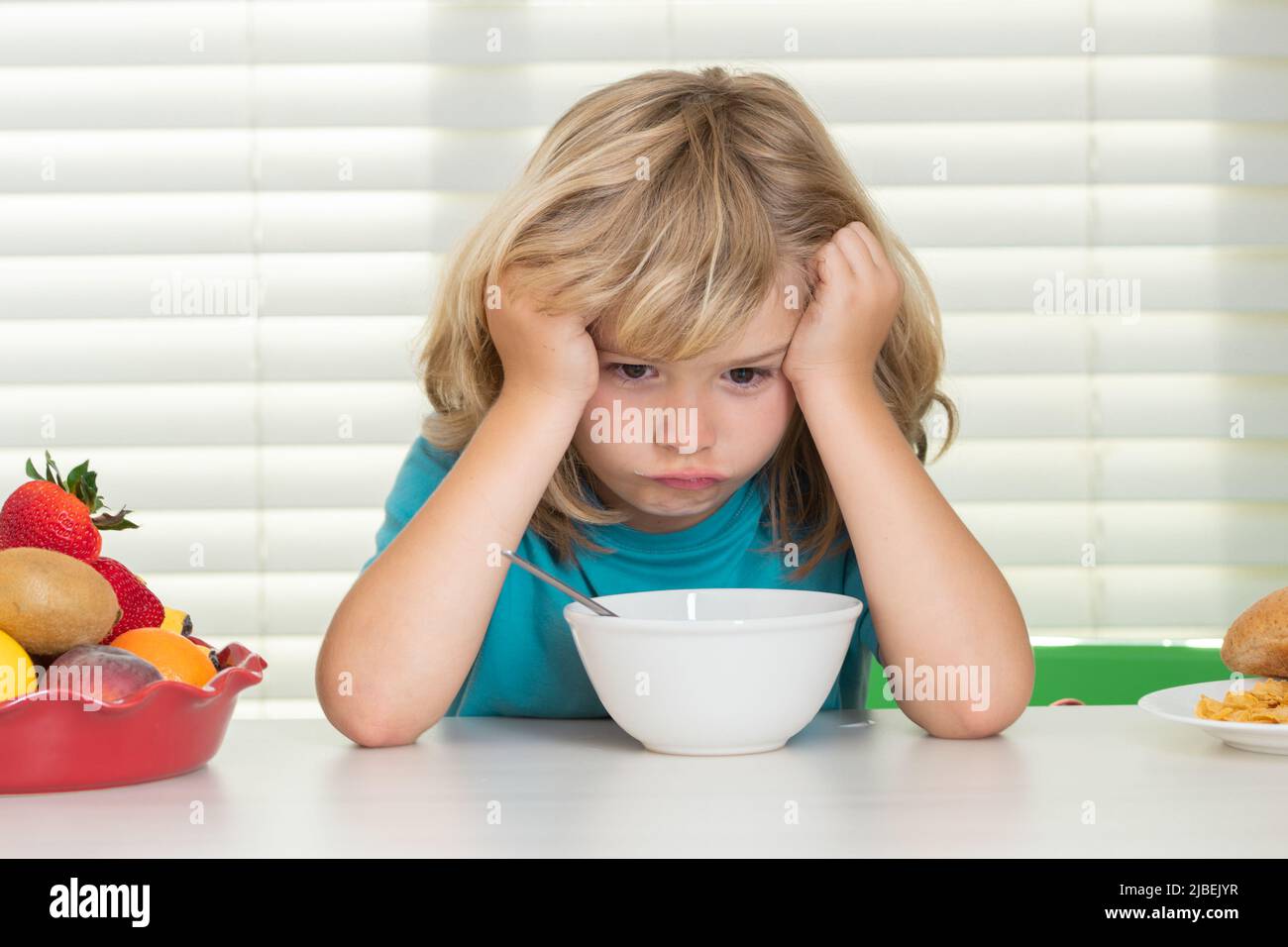 Portrait of child with no appetite. Concept of loss of appetite. Kid ...