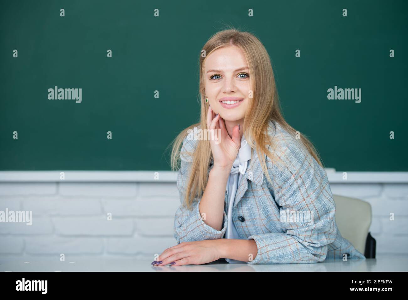 High school student learning english or mathematics in class. Positive ...