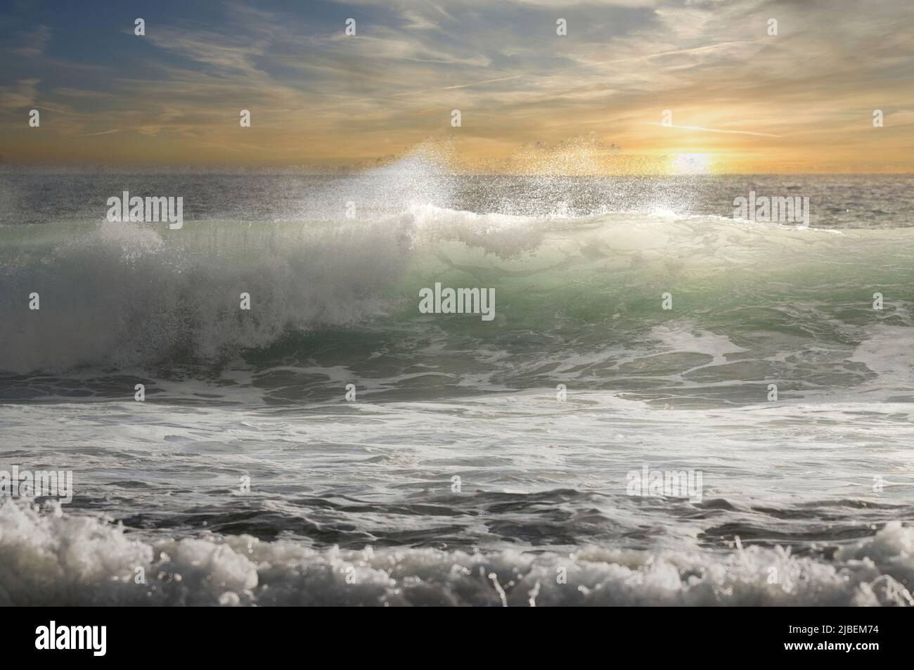 White capped waves at sunset on Maui Stock Photo - Alamy