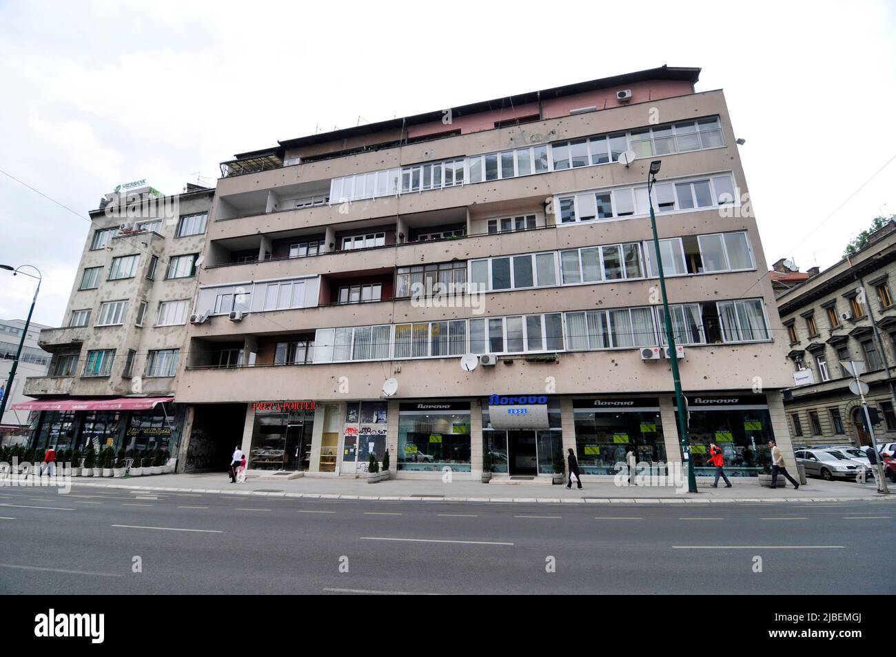 A building covered with bullet holes from the 1990's Bosnian war in ...