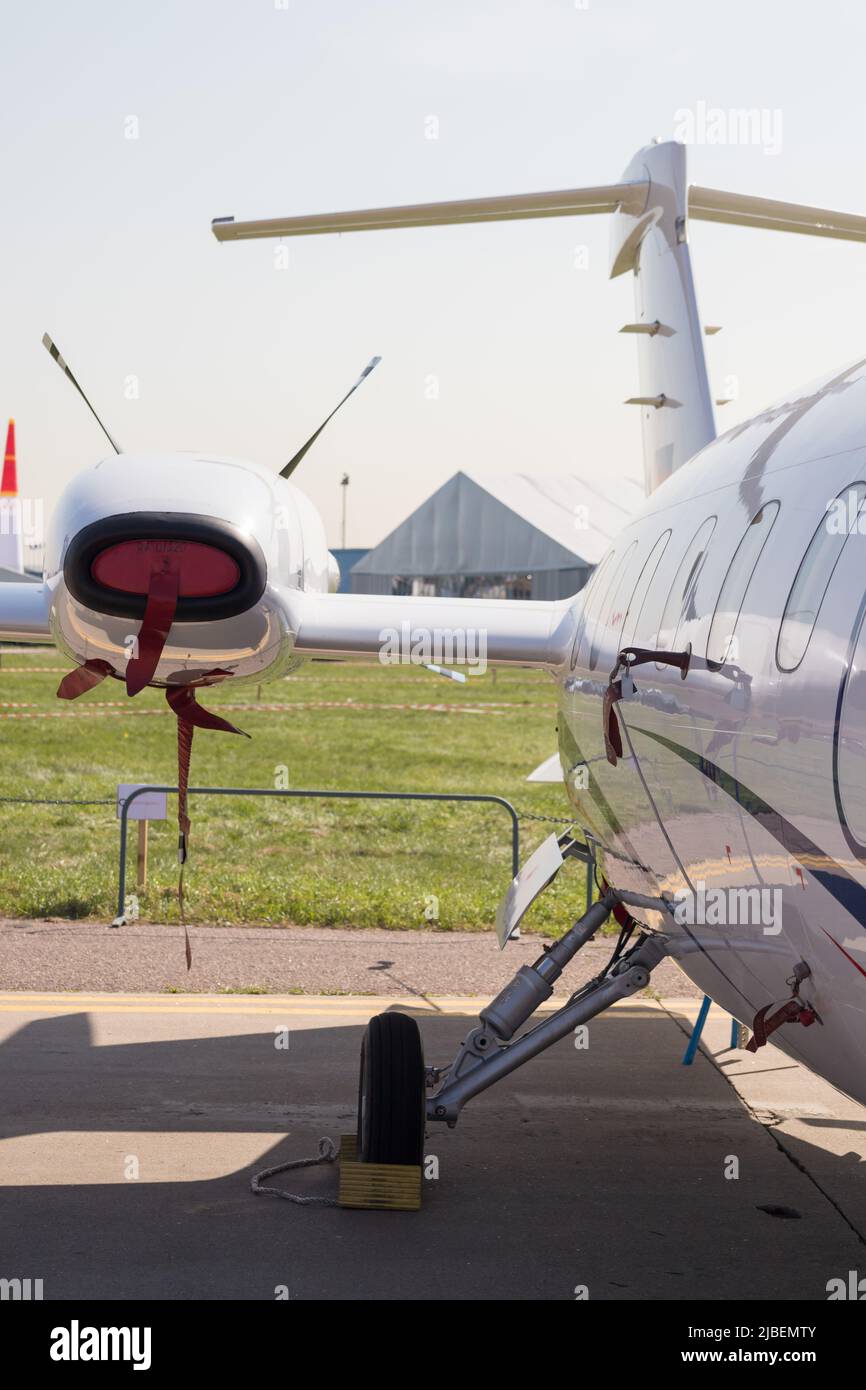 An outdoors airplane exposition - an airplane with strange things on ...