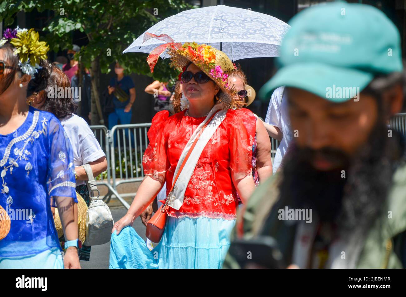 A woman is seen with traditional Filipino outfits during the annual ...