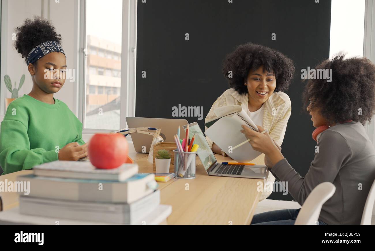 Classroom with diverse learners of happily African American students ...