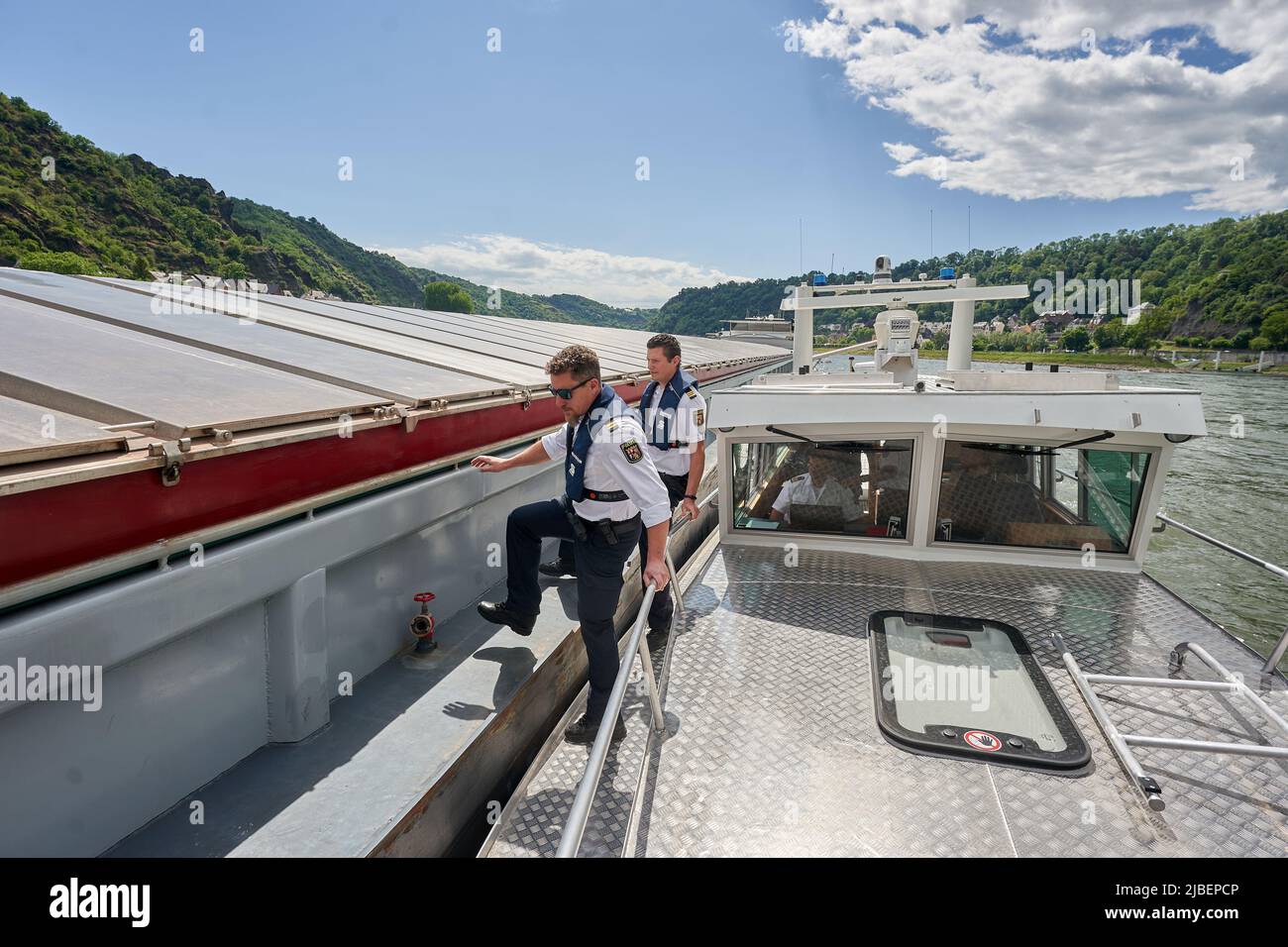St. Goar, Germany. 31st May, 2022. Police officer Jochen Fier (front ...