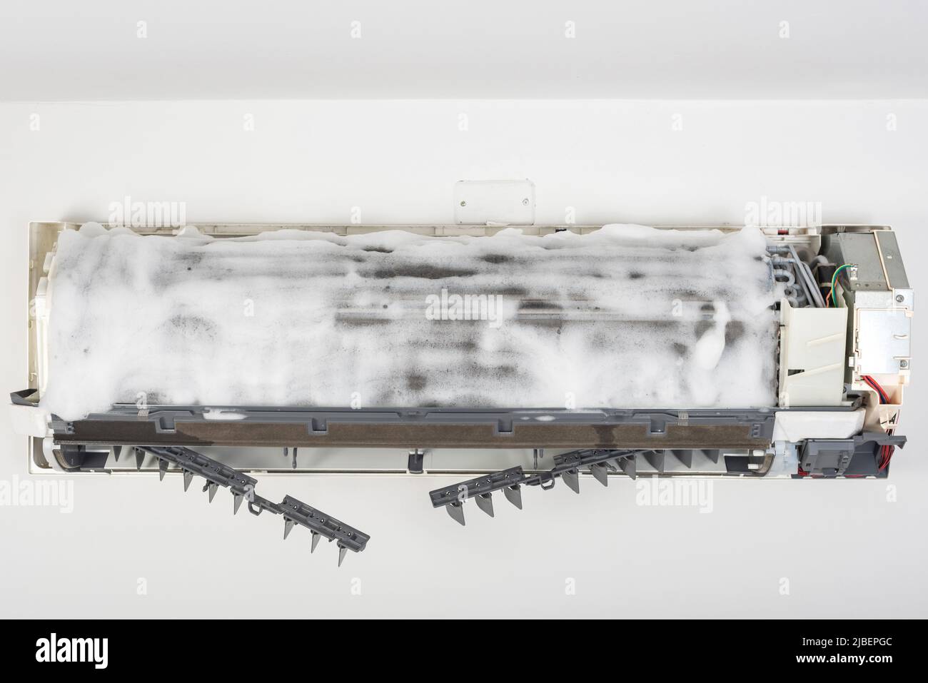 Cleaning air conditioner indoor unit. Maintaining the air conditioner ...