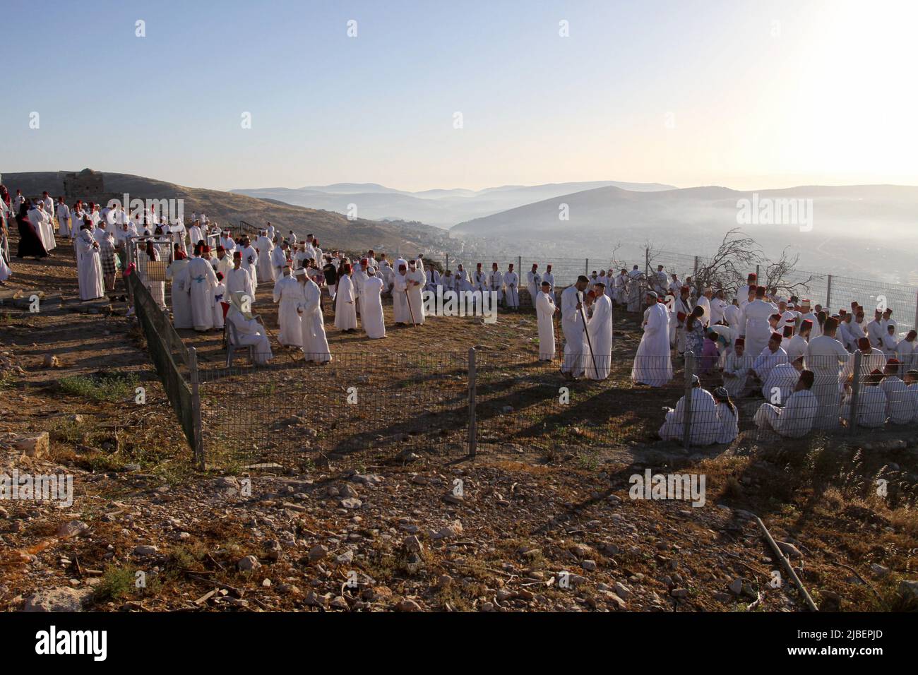 Members of the ancient Samaritan community pray during the holiday of ...