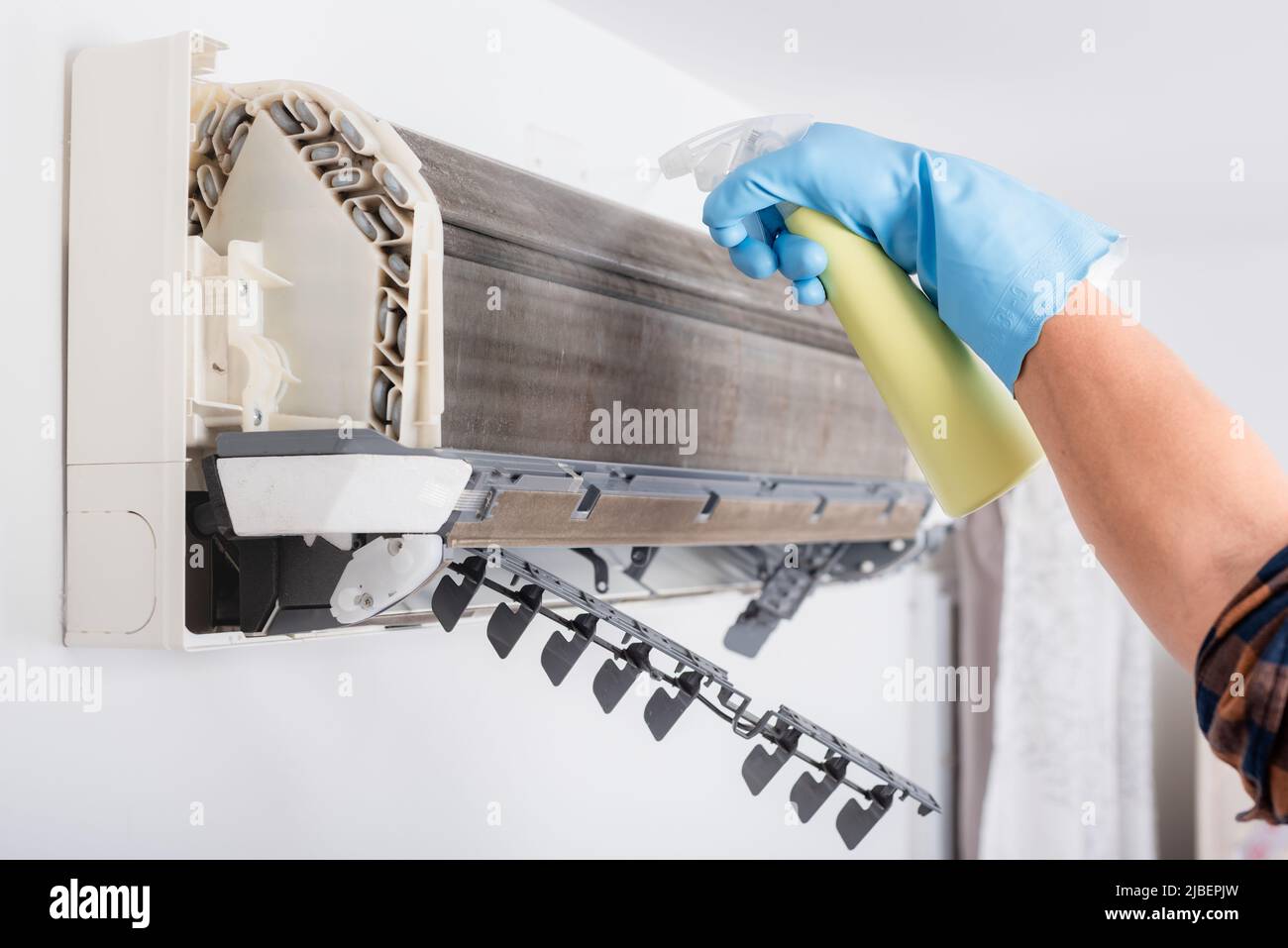 Cleaning air conditioner indoor unit. Maintaining the air conditioner ...