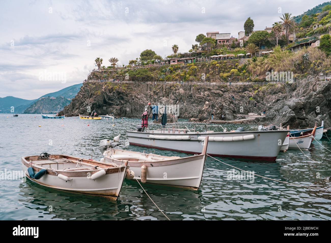 Small boats in the harbor of Cinque Terre, which consists of five ...