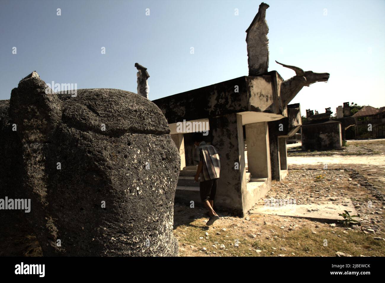 Old and new graves at traditional cemetery in traditional village of ...