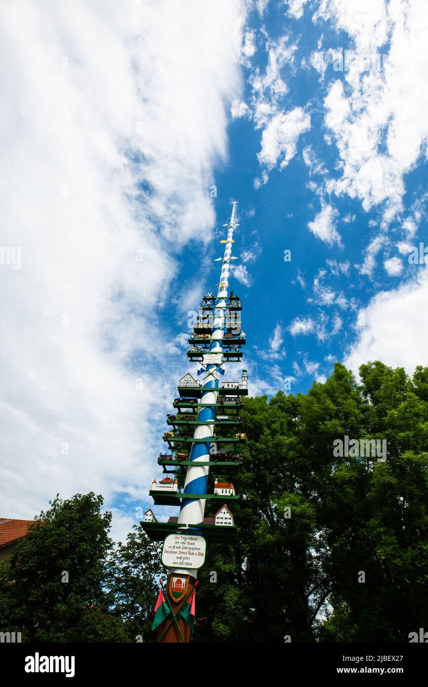 Maypole with white blue sky, tradiion in bavaria Stock Photo - Alamy
