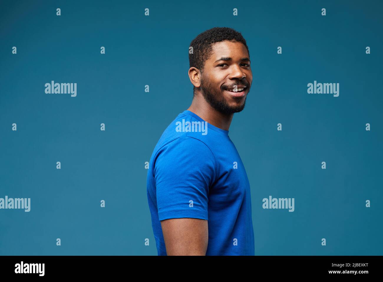 Man in vibrant blue shirt hi-res stock photography and images - Alamy
