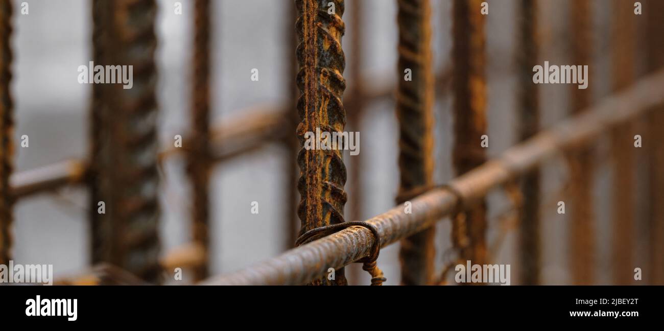 Construction of a concrete wall with reinforcement. Private house ...