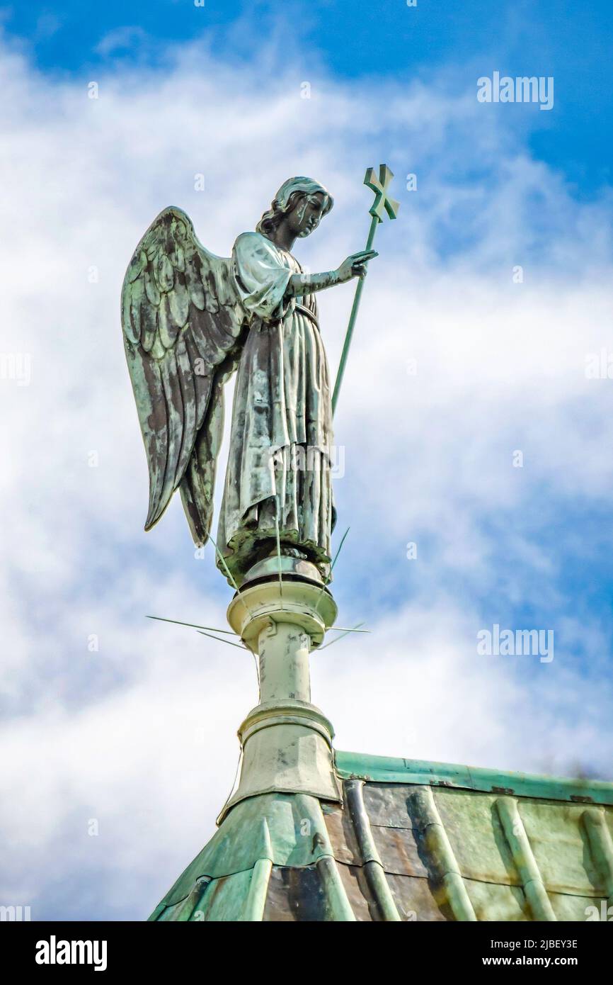 Chartres, France - April 19, 2013: Statue of Angel at top of Cathedral ...