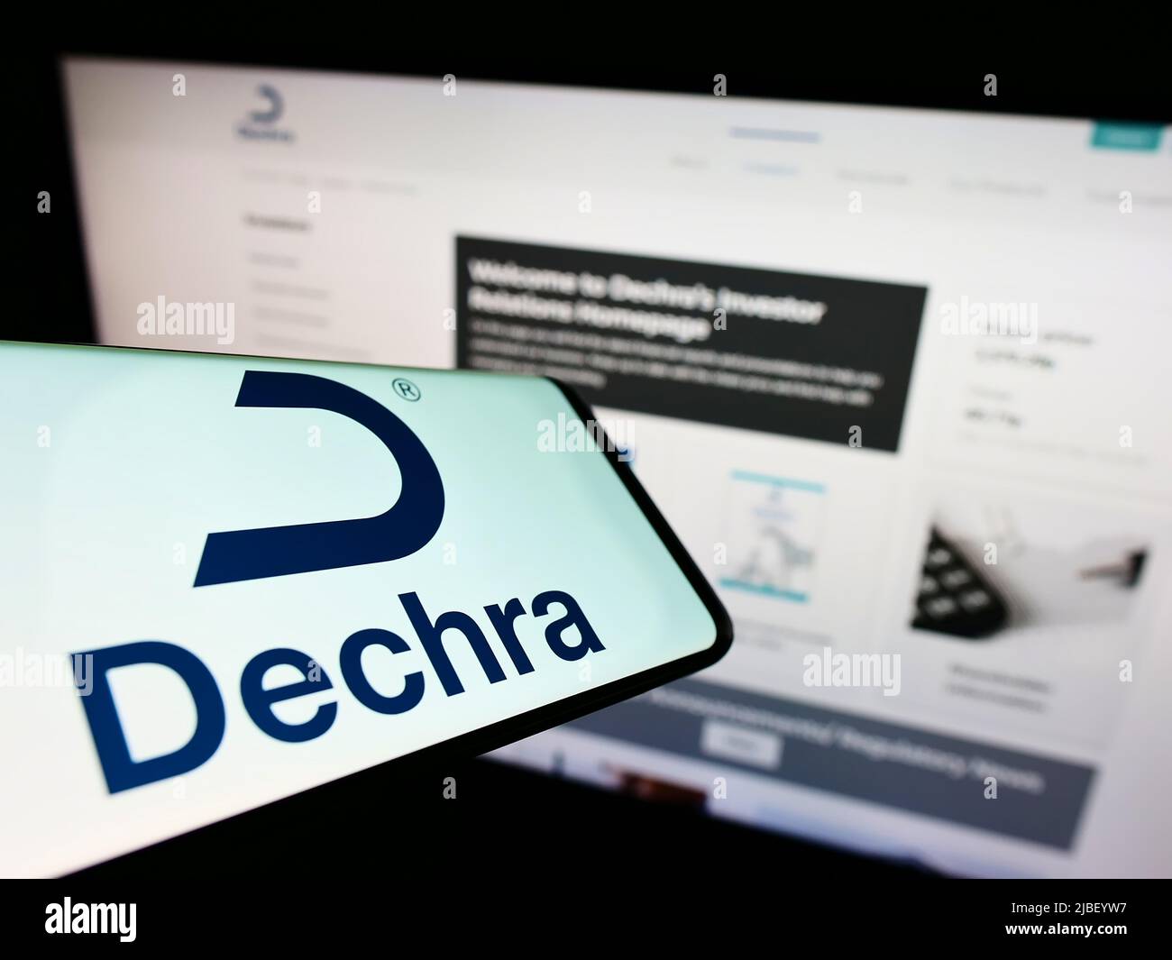 Mobile phone with logo of British company Dechra Pharmaceuticals plc on ...