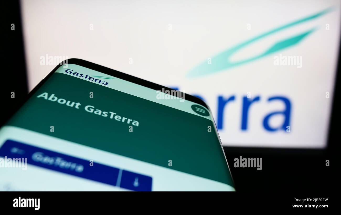 Mobile phone with webpage of Dutch energy company GasTerra B.V. on ...