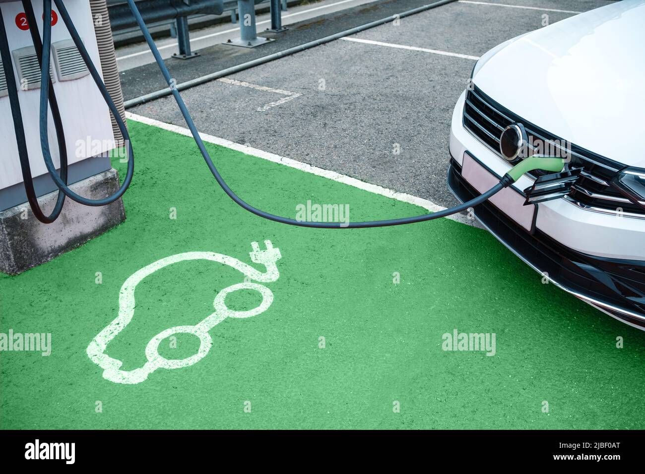 Electric car icon printed on electric vehicle charging station Stock ...