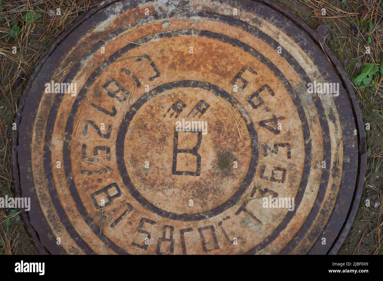 Rusty manhole cap grunge manhole cover with clipping path underground ...