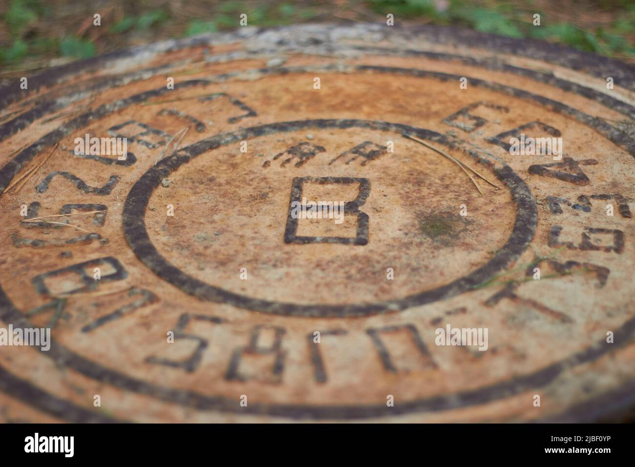 Rusty manhole cap grunge manhole cover with clipping path underground ...