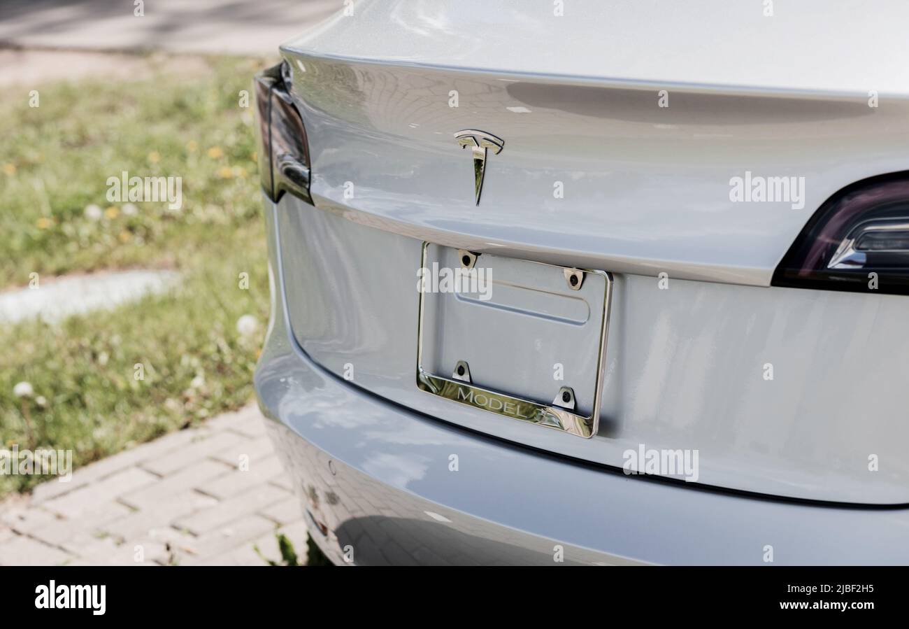 Minsk, Belarus, June 2022 - Tesla Motors logo on silver car. back view ...