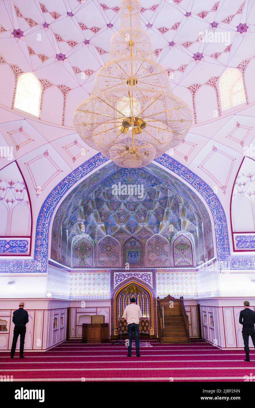 Bukhara, Uzbekistan. December 2021. Interior and worshippers at the ...
