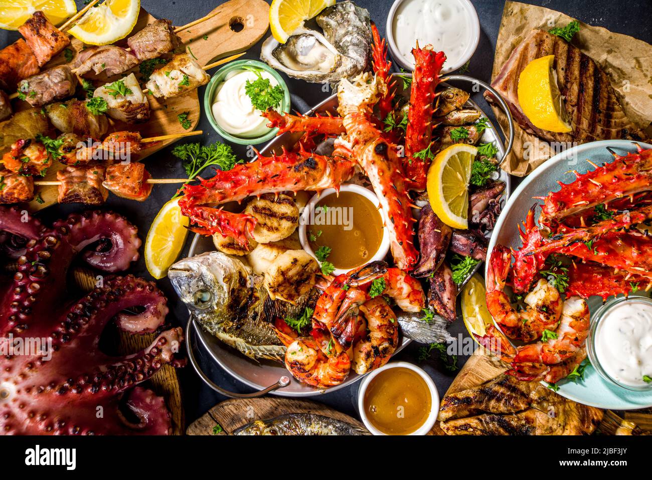 Assortment various barbecue Mediterranean grill food - fish, octopus ...