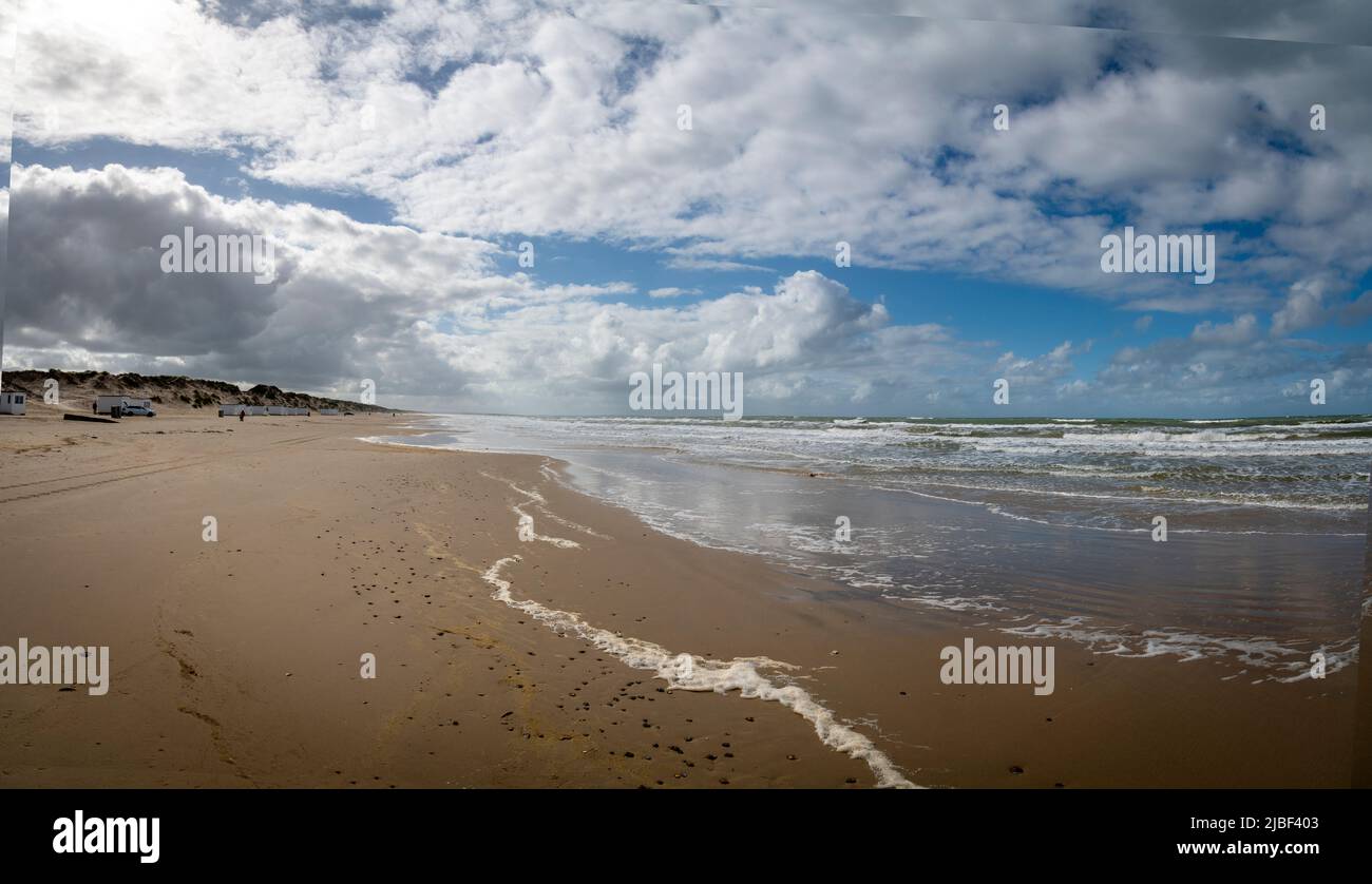 Clouds over beach Stock Photo - Alamy
