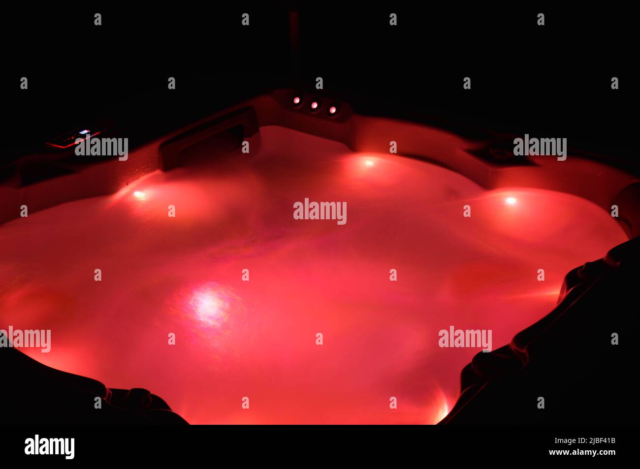 View on a spa at night, Hot Tub at night, France Stock Photo - Alamy