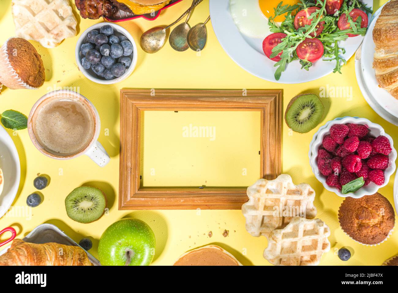 Various traditional breakfast food - fried eggs with bacon, muesli ...