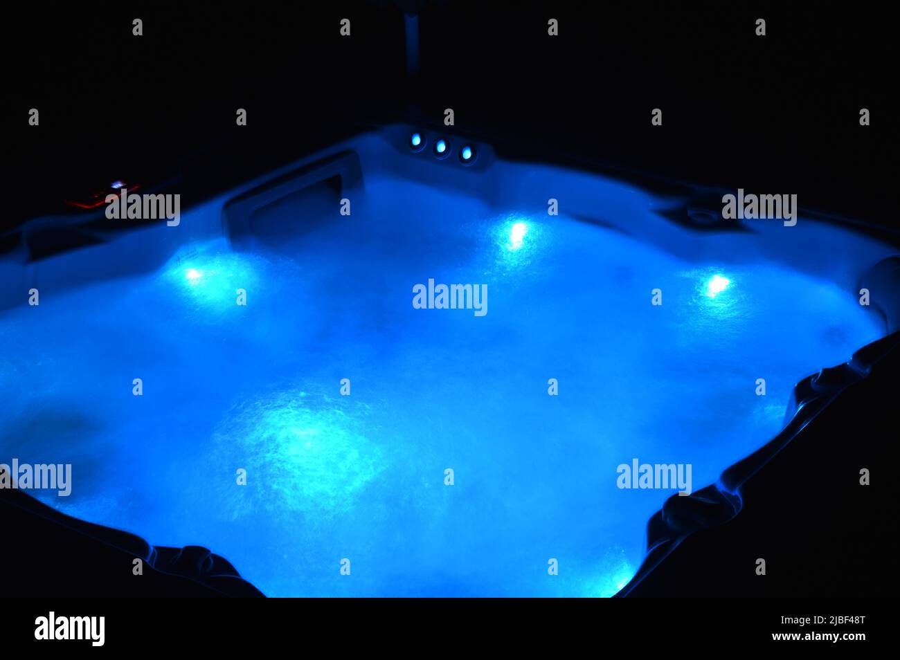 View on a spa at night, Hot Tub at night, France Stock Photo - Alamy