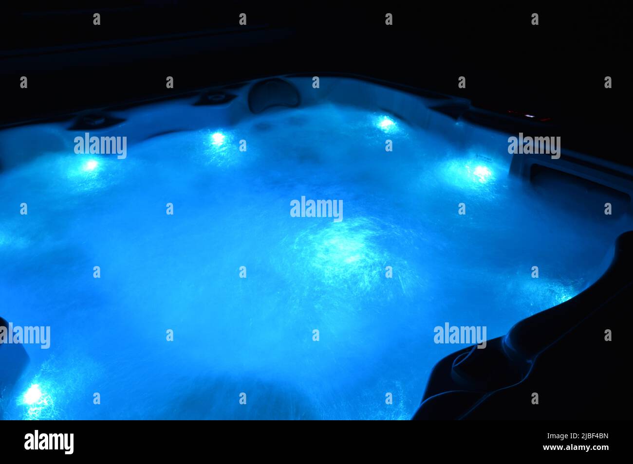 View on a spa at night, Hot Tub at night, France Stock Photo - Alamy