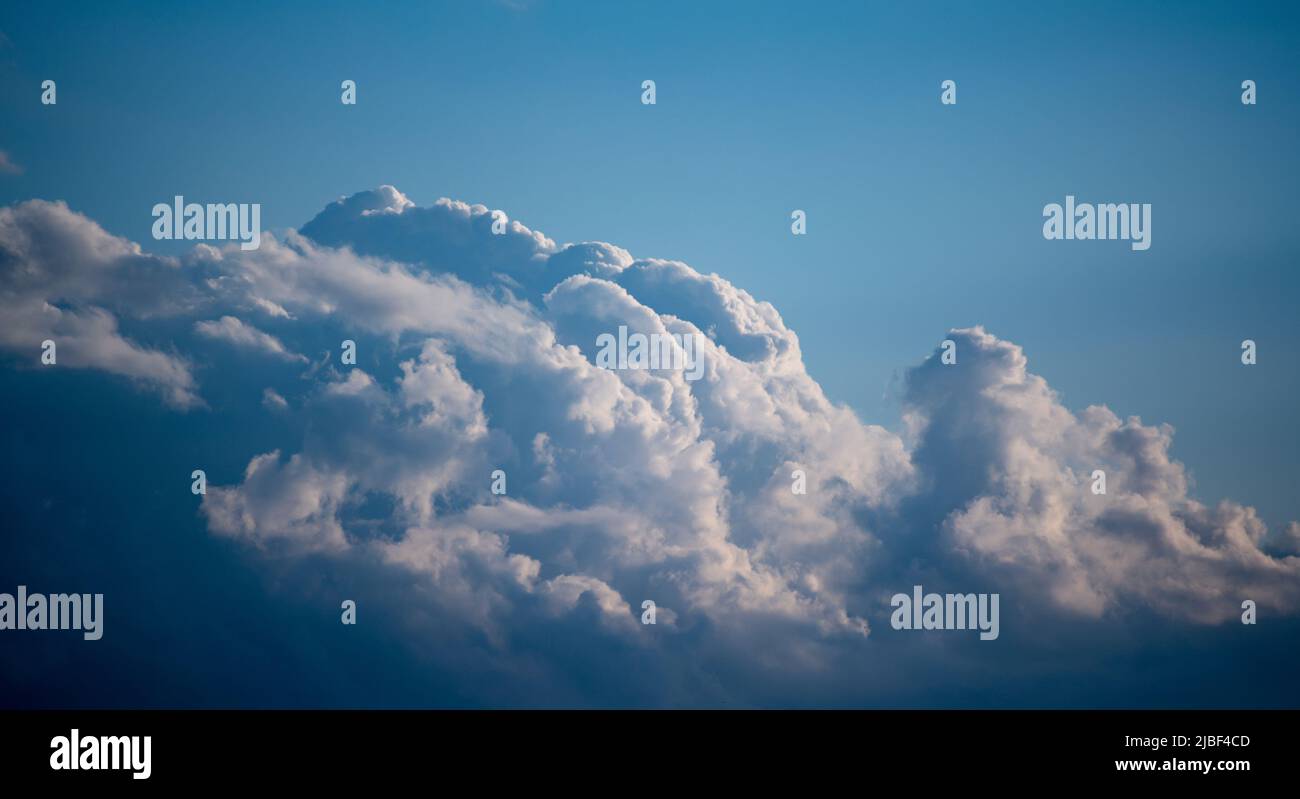 Dramatic blue sky with white clouds Stock Photo - Alamy