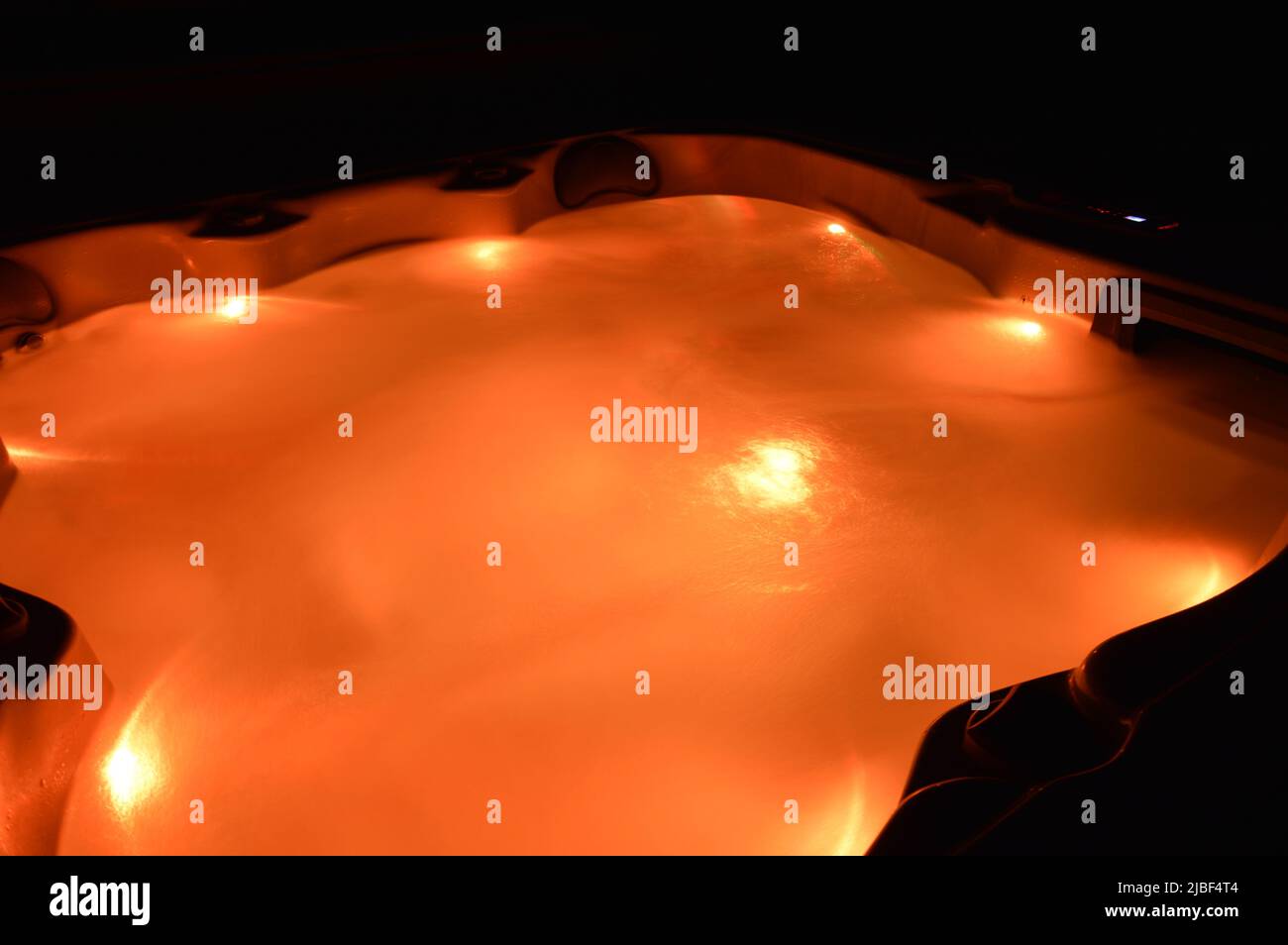 View on a spa at night, Hot Tub at night, France Stock Photo - Alamy