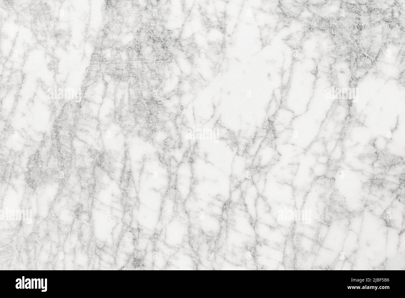The texture of natural white marble made of natural tiles is a ...