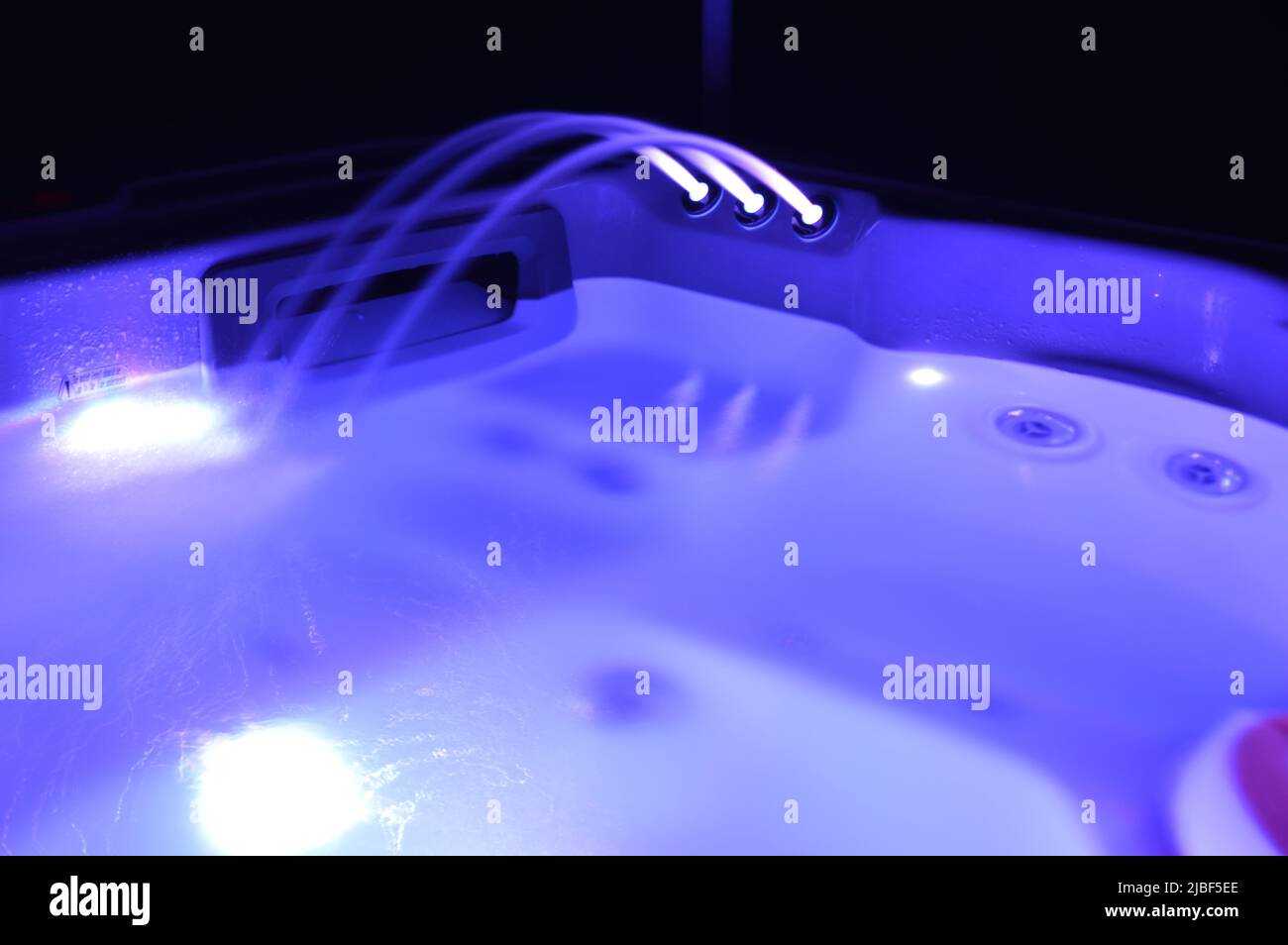 View on a spa at night, Hot Tub at night, France Stock Photo - Alamy