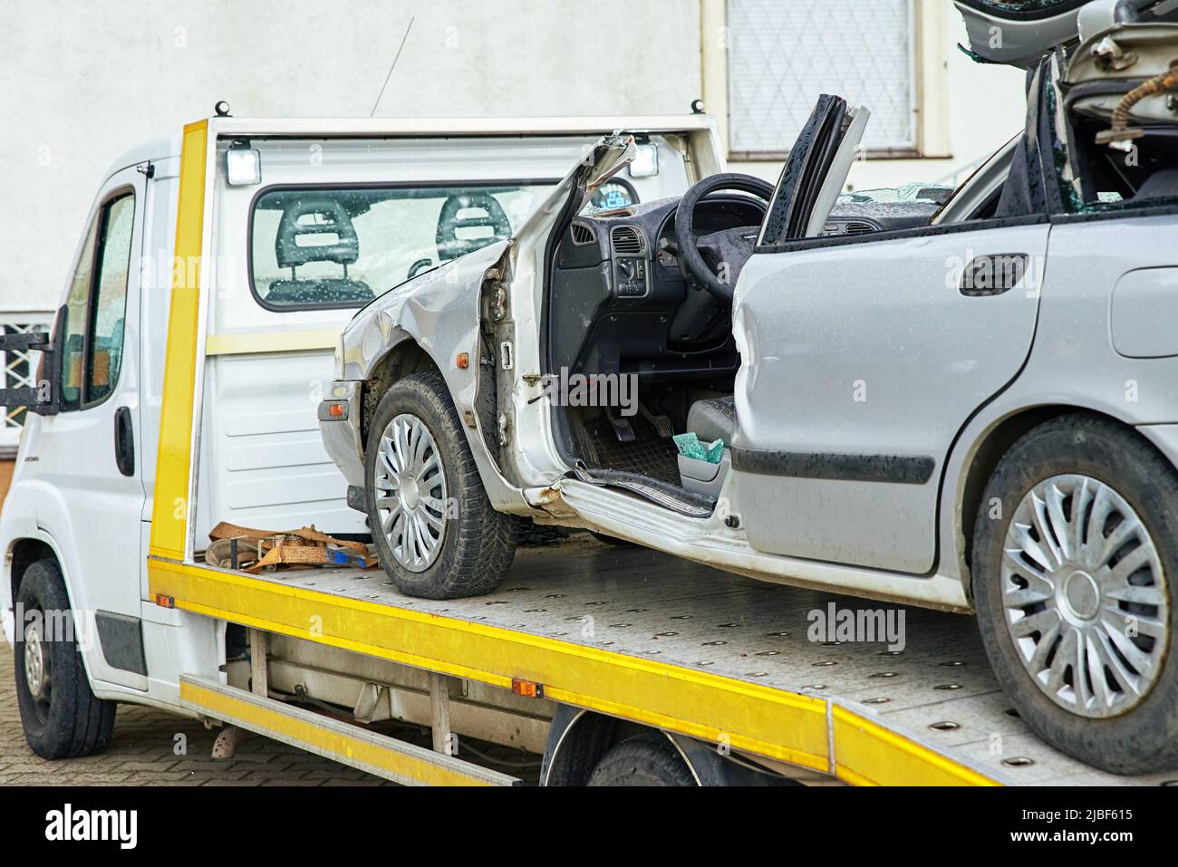 Wrecked car loading on tow truck after crash traffic accident, Concept ...