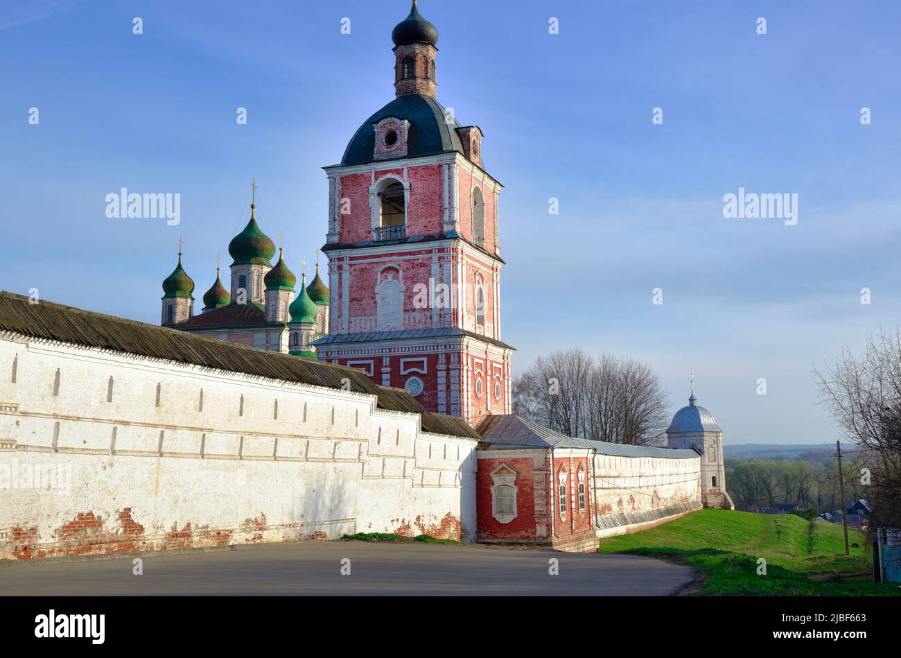 The walls of the Goritsky Assumption Monastery. Bell tower in the ...