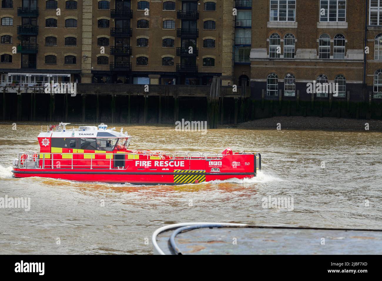Fire Rescue boat of the London Fire Brigade, on the river Thames ...