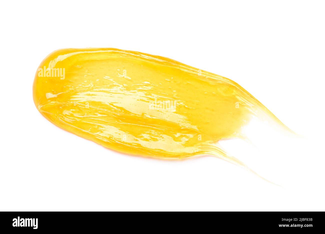 Clear transparent yellow face cream smear smudge, golden sugar honey ...