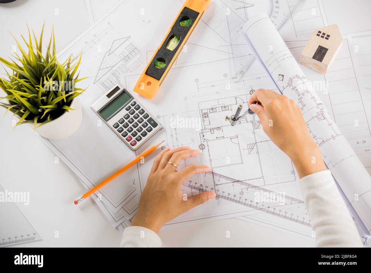 Architectural project workplace. Engineer sketching construction ...