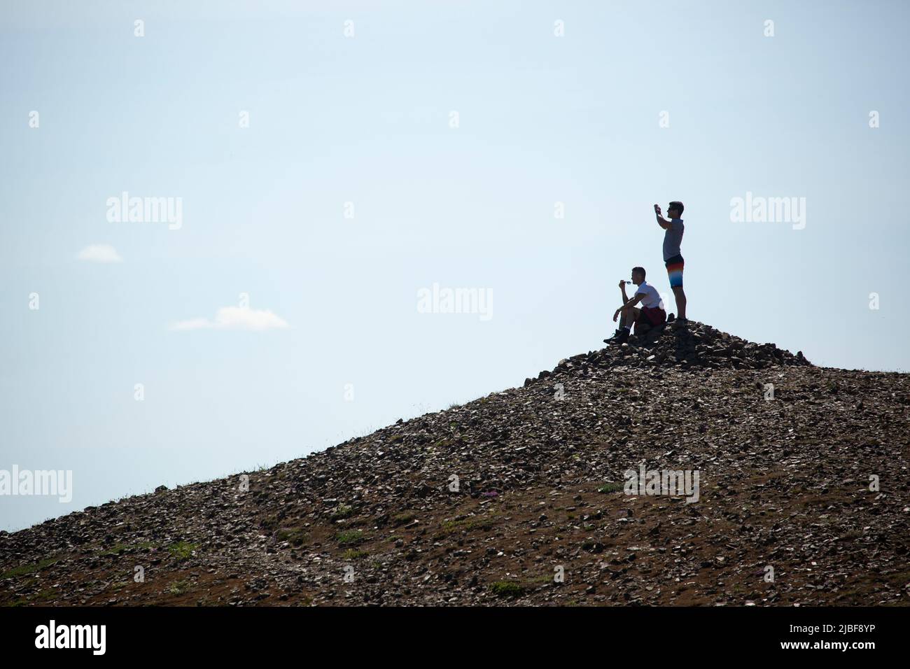 Men on hill hi-res stock photography and images - Alamy